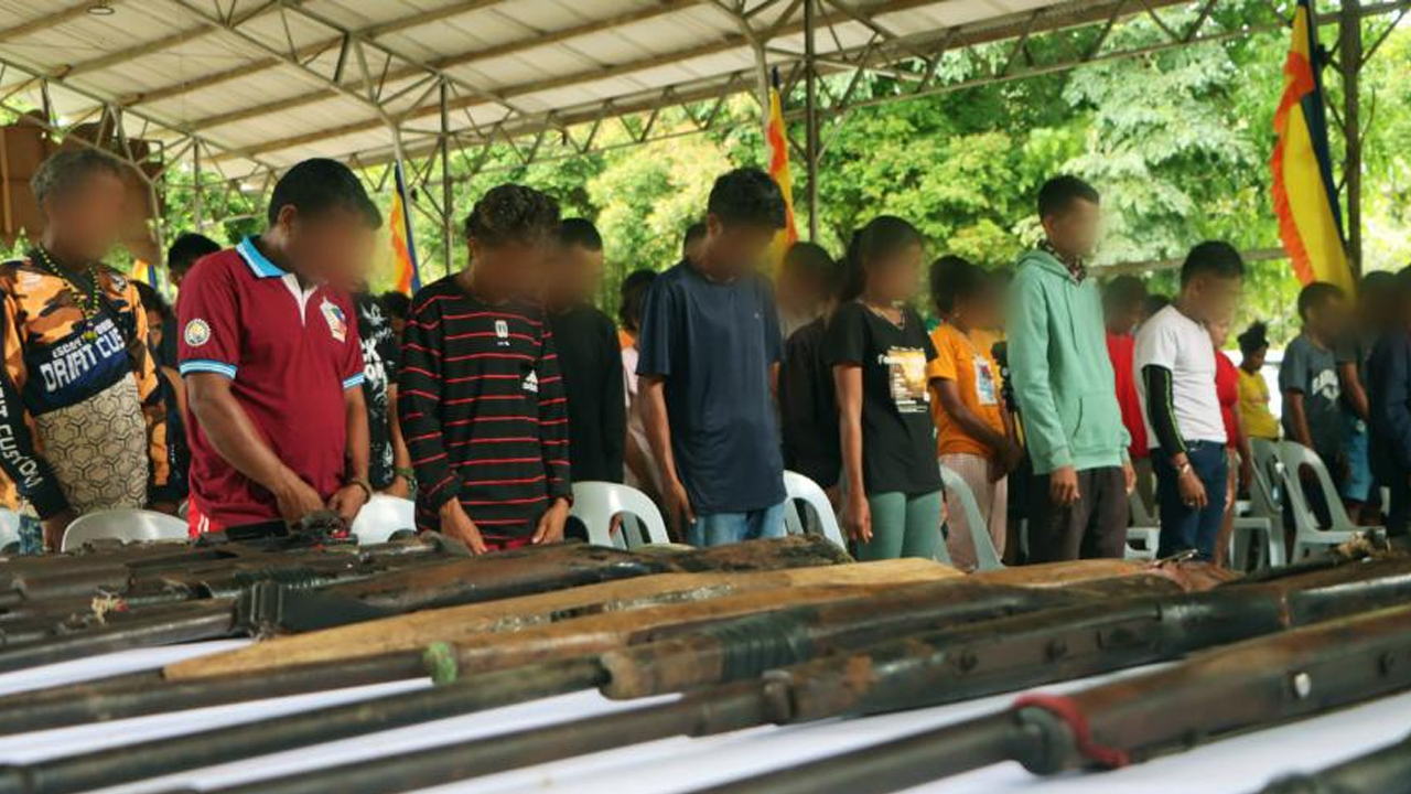 89 Ex-NPA rebels surrender in Davao, hand over guns, get ₱1.1M ...